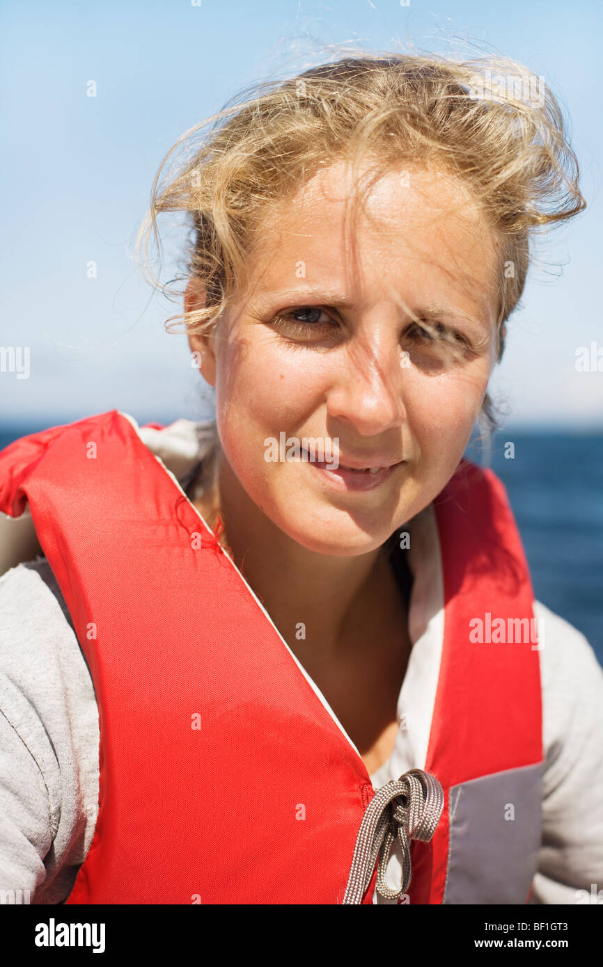 A woman wearing a life jacket, Sweden Stock Photo - Alamy