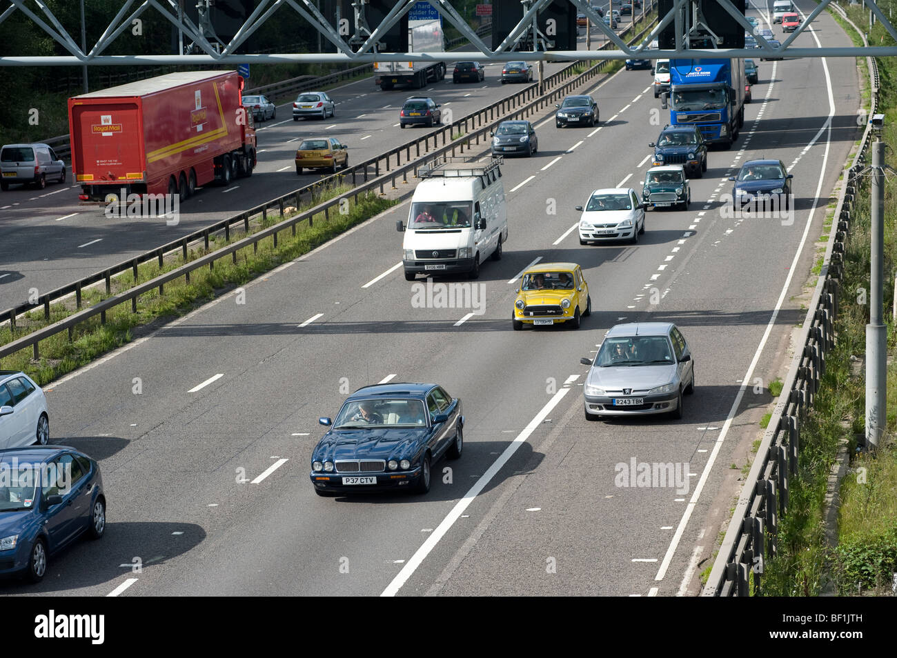 Variable Speed Limit Section Of The M42 Showing Traffic Using The Hard Shoulder In Attempt To