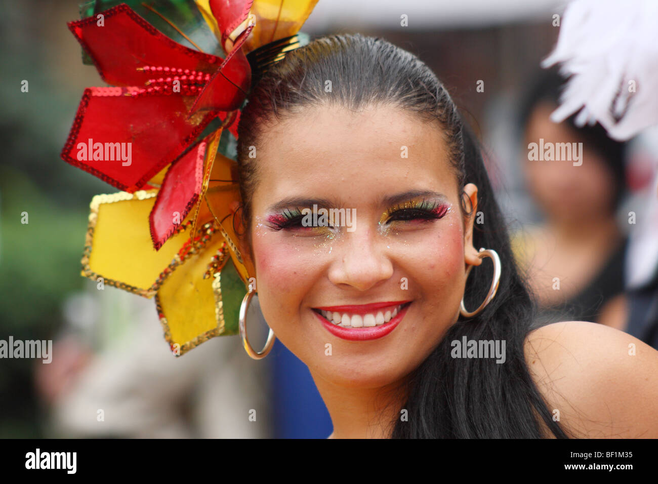 A beautiful folkloric dancer smiles for the camera. Member of QUITUS ...
