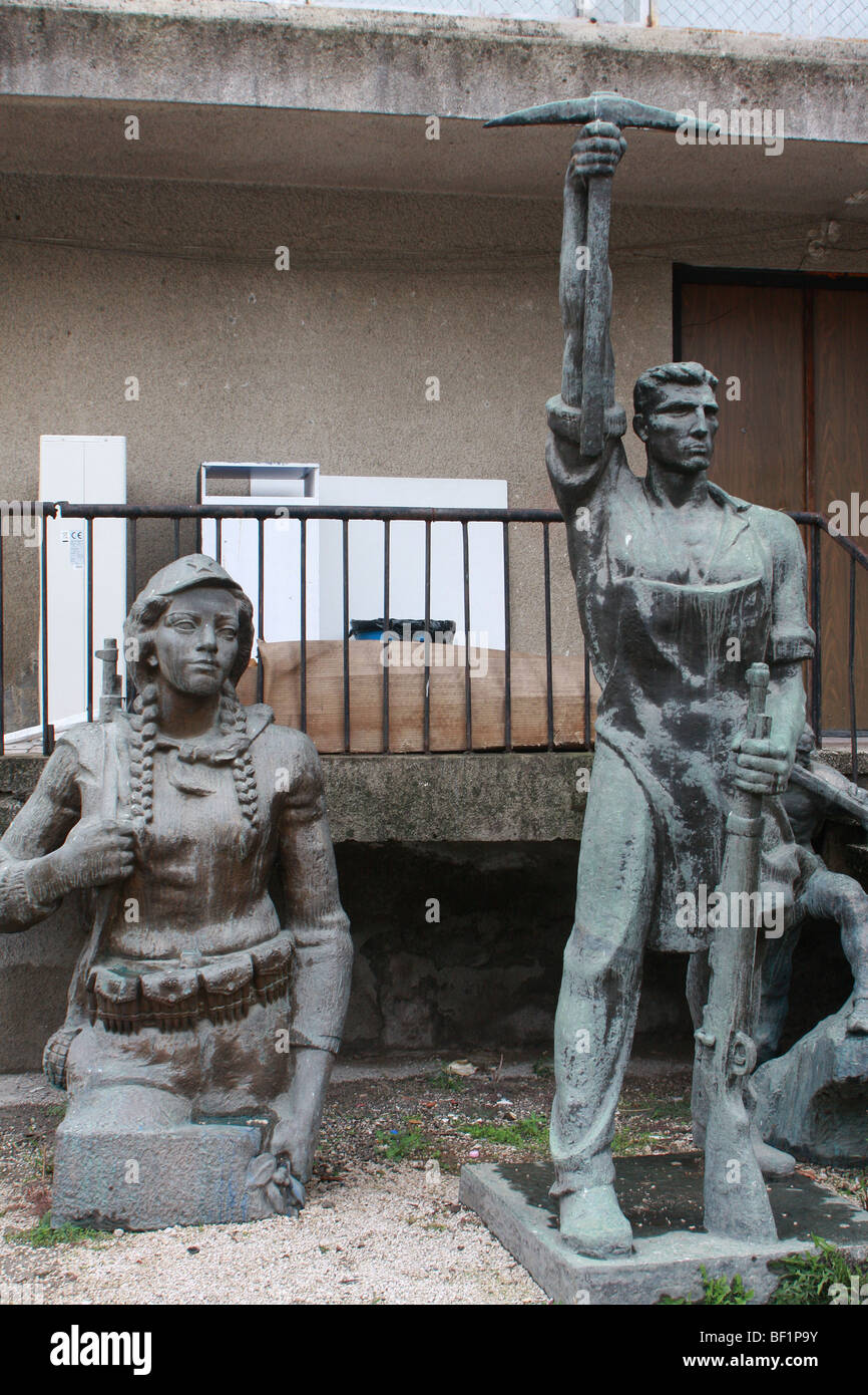 Old Partisan fighter statues behind the History of Arts Museum, Tirana ...