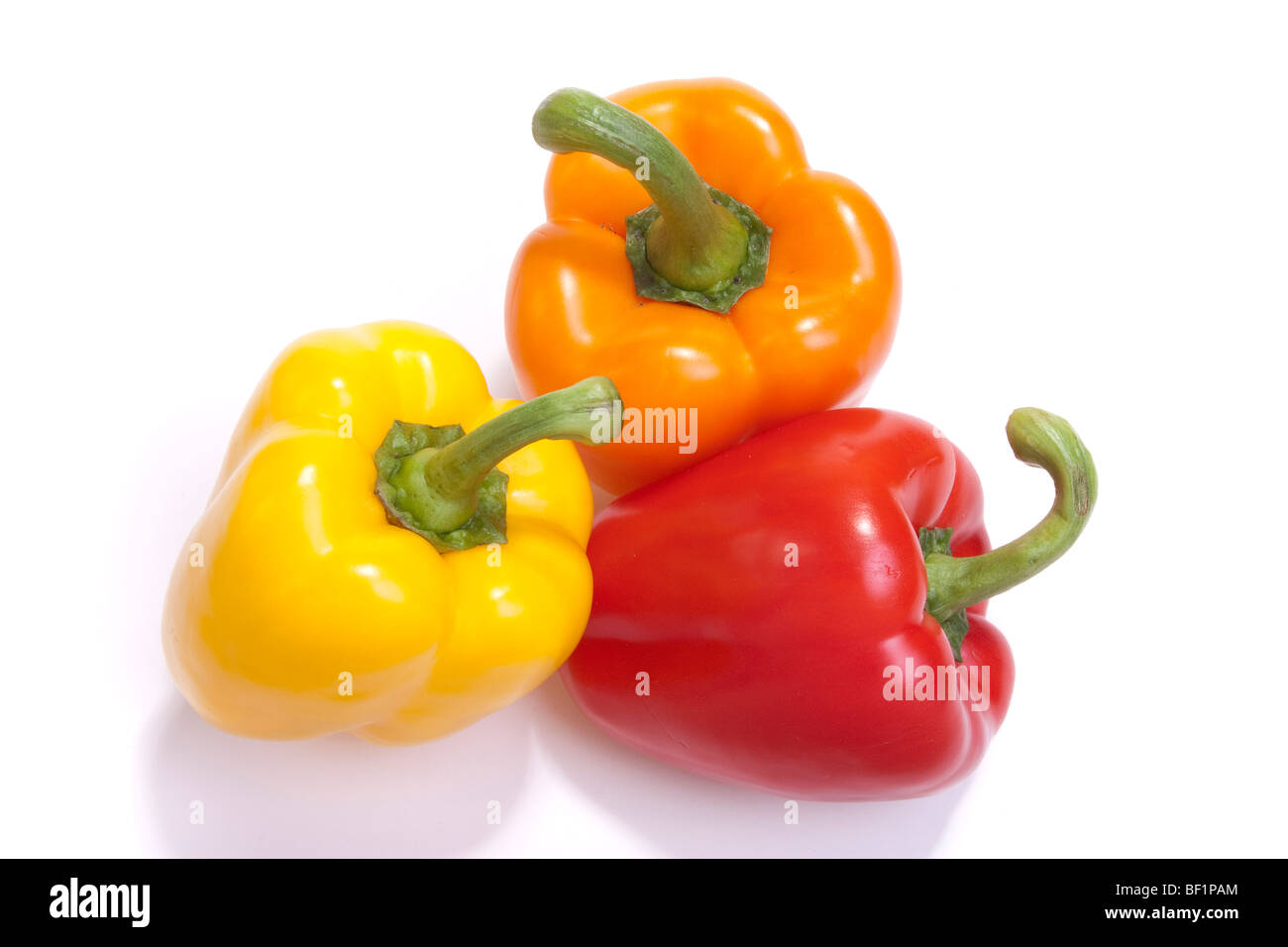 A selection of Multicoloured Bell Peppers isolated against white ...