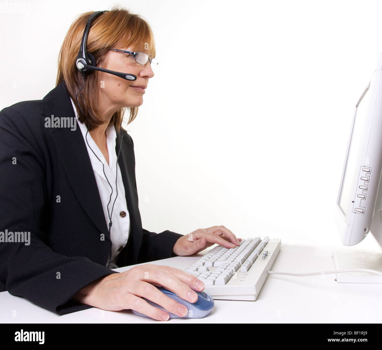Mature call centre lady hi-res stock photography and images - Alamy