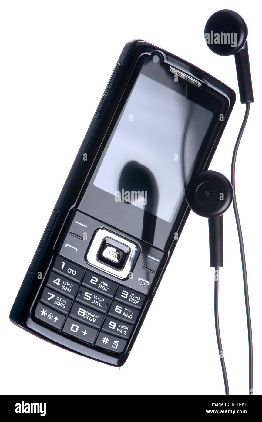 object on white - mobile phone with head set Stock Photo - Alamy