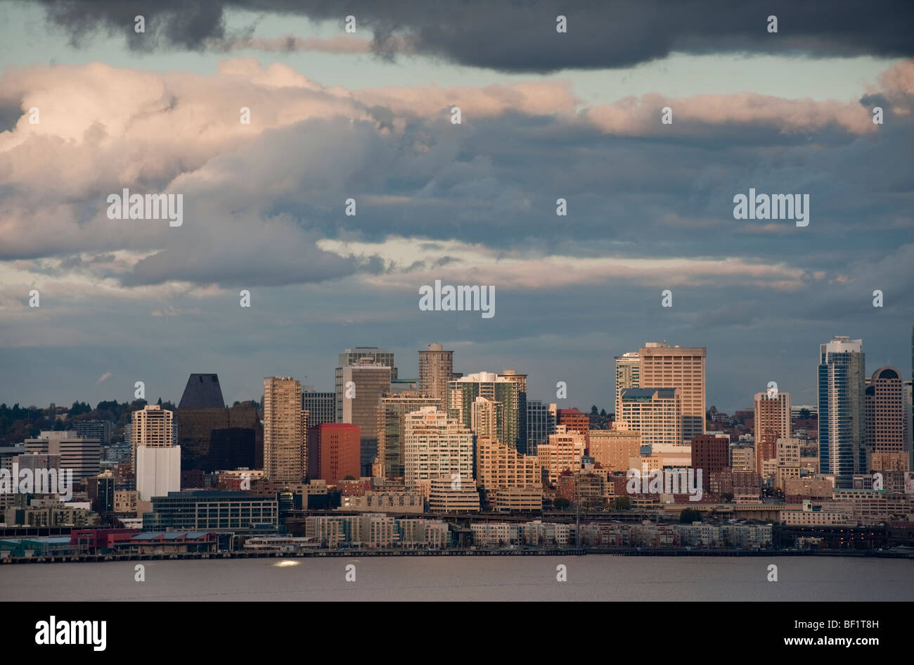 A dramatic sunset view of the Seattle, Washington skyline in Puget ...