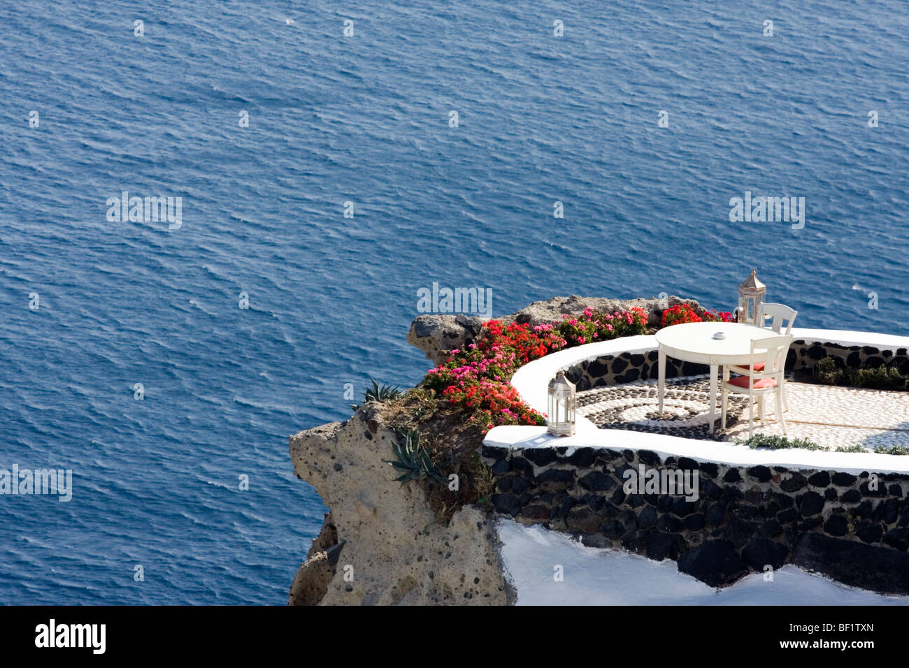 Table on a cliff with a view Stock Photo - Alamy