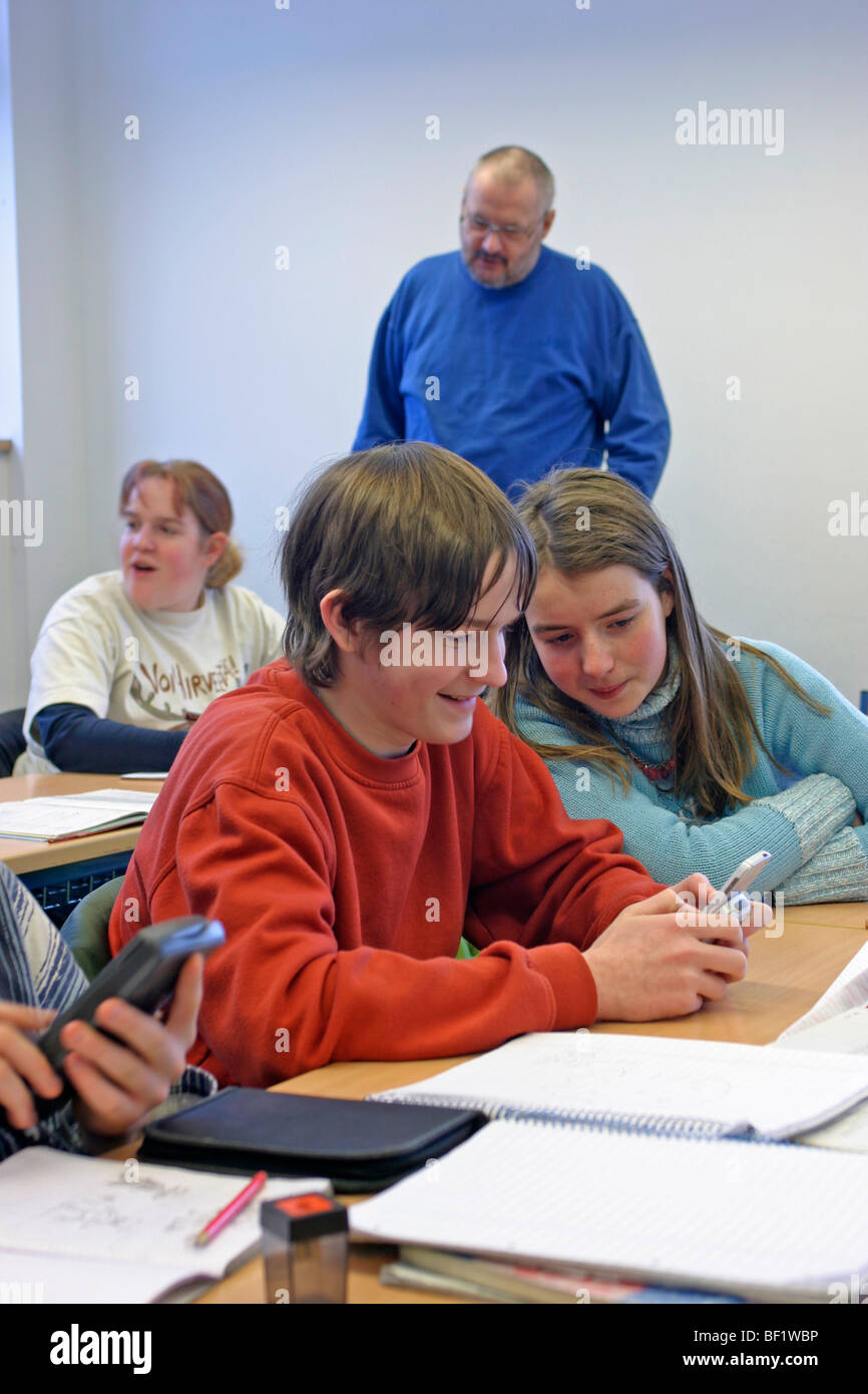kids at school using their mobile phones Stock Photo - Alamy kids at school using their mobile phones Stock Photo - Alamy