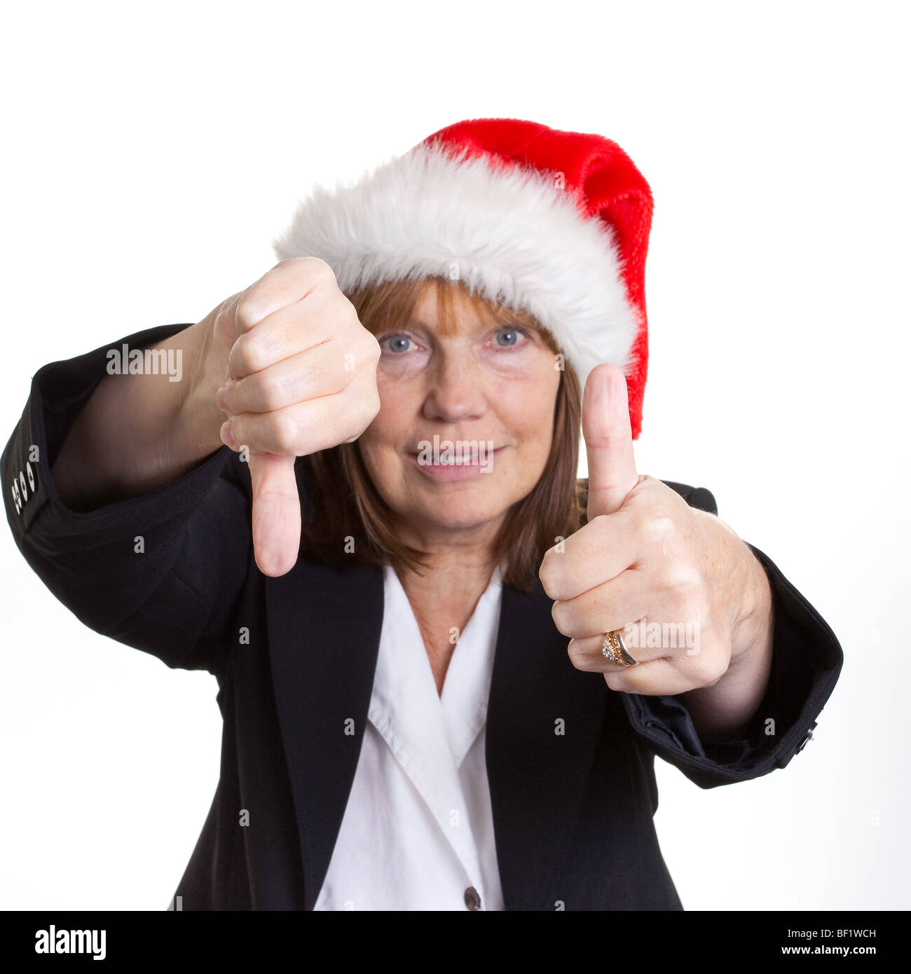 Older senior business woman's arthritic hand with knobbly fingers in a ...
