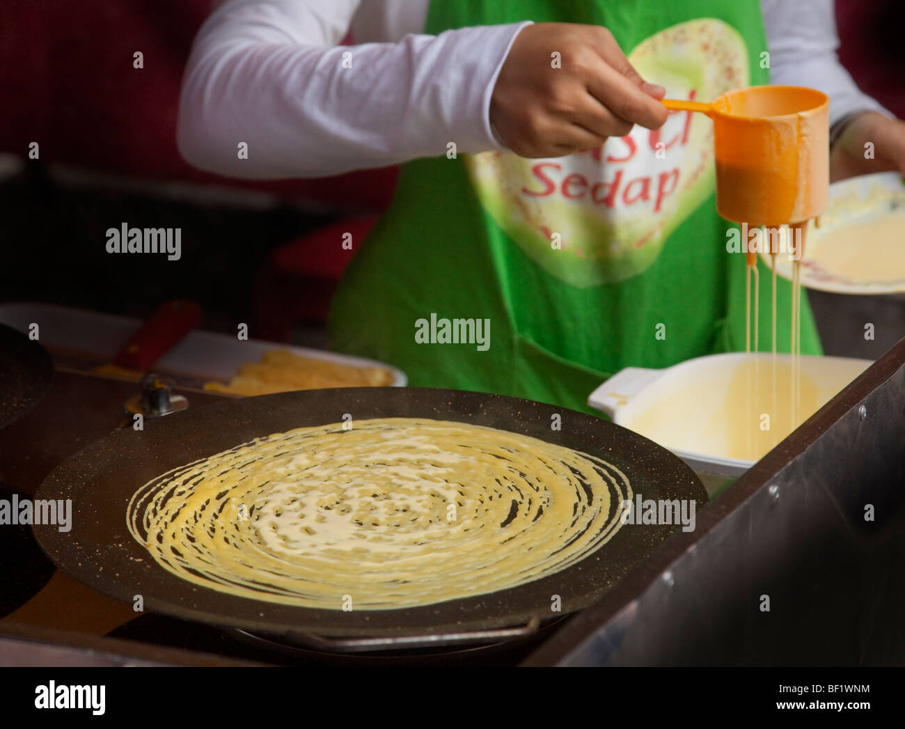 Making Roti Jala a Malaysian street food, Pasir Mallam Stock Photo - Alamy