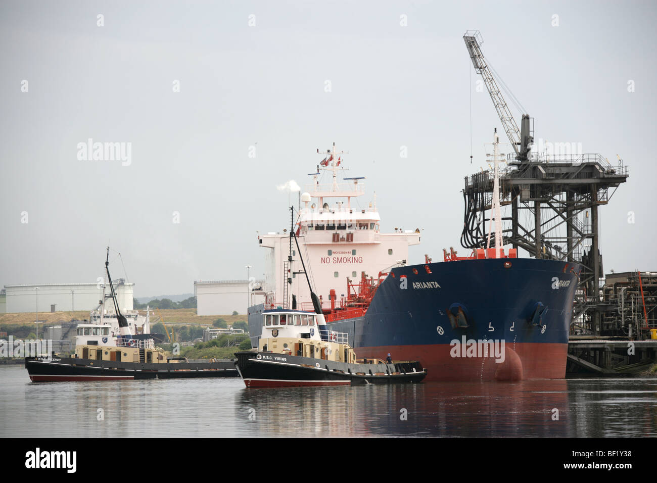 Manchester Ship Canal, England. Oil ship being loaded at the Shell ...
