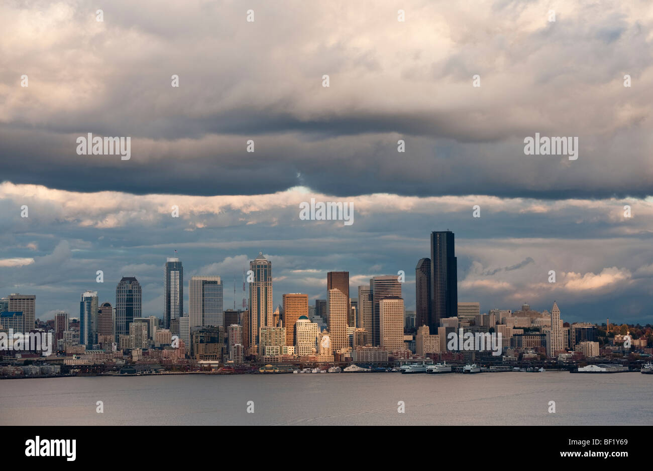 A dramatic sunset view of the Seattle, Washington skyline in Puget ...