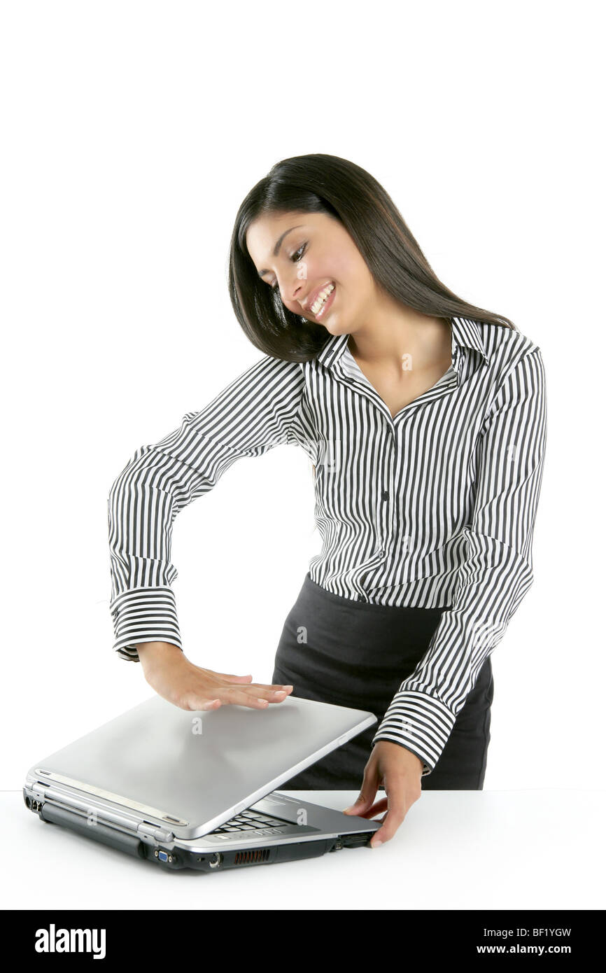 Beautiful brunette woman closing laptop computer Stock Photo - Alamy