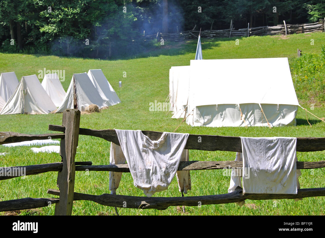 Drying clothes on fence in military tent camp - costumed American ...