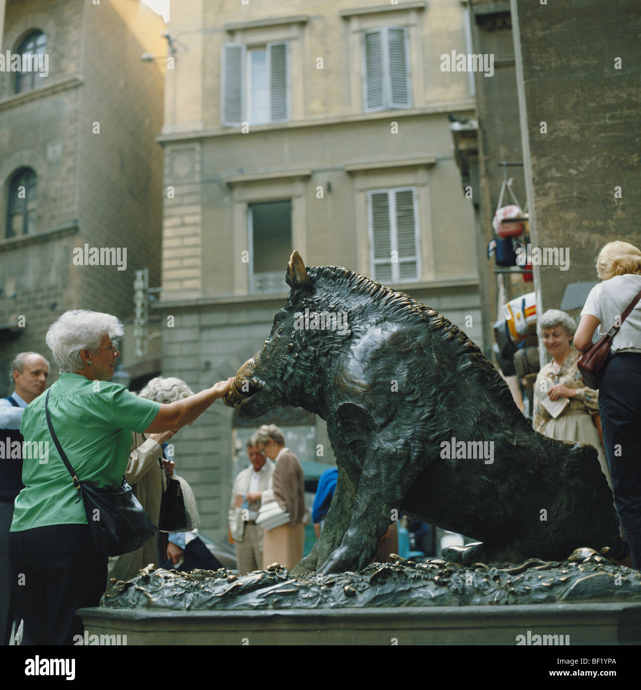 Florence, statue of a wild boar, traditionally being stroked for luck ...