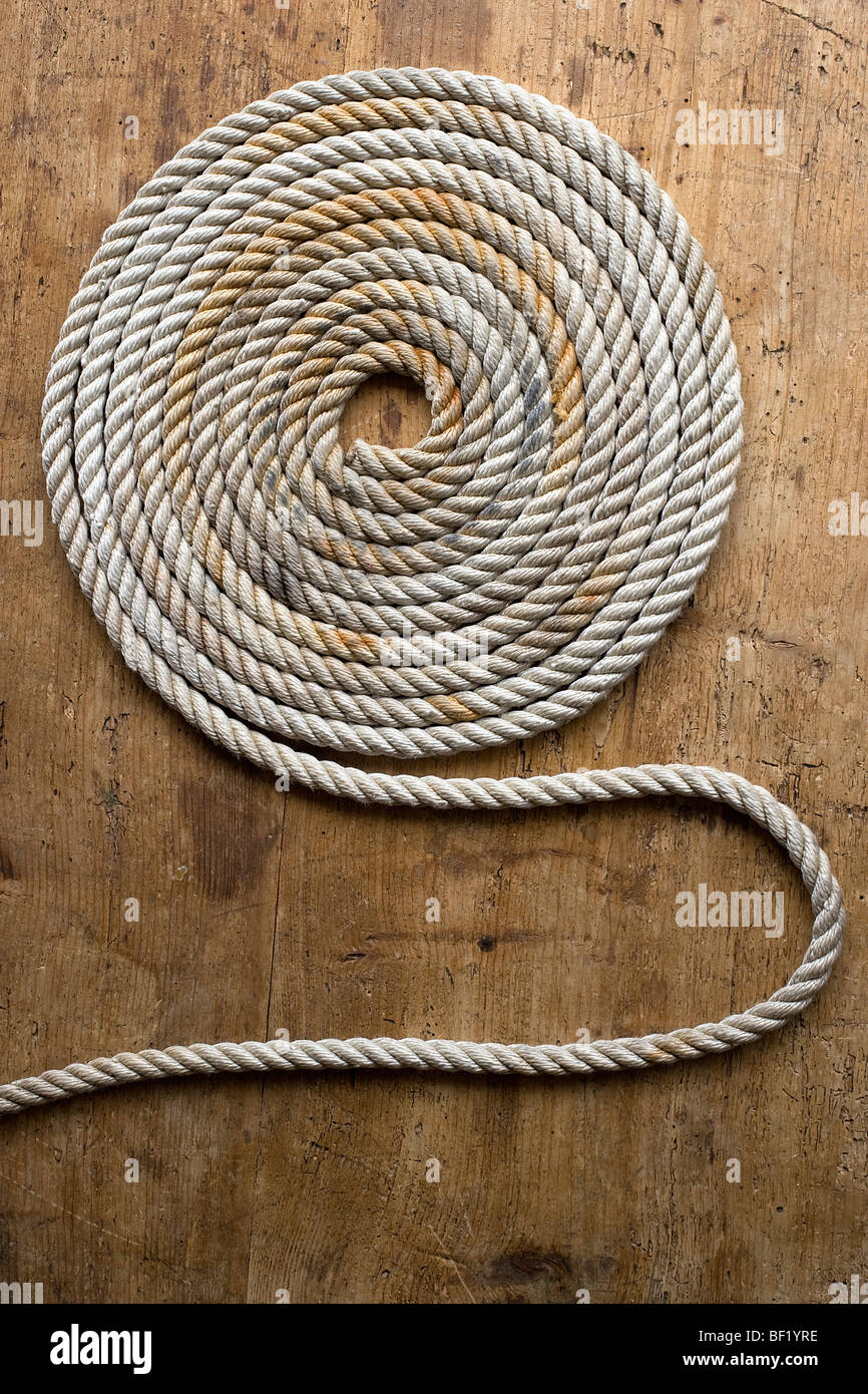 Rope coil on an antique chest Stock Photo - Alamy