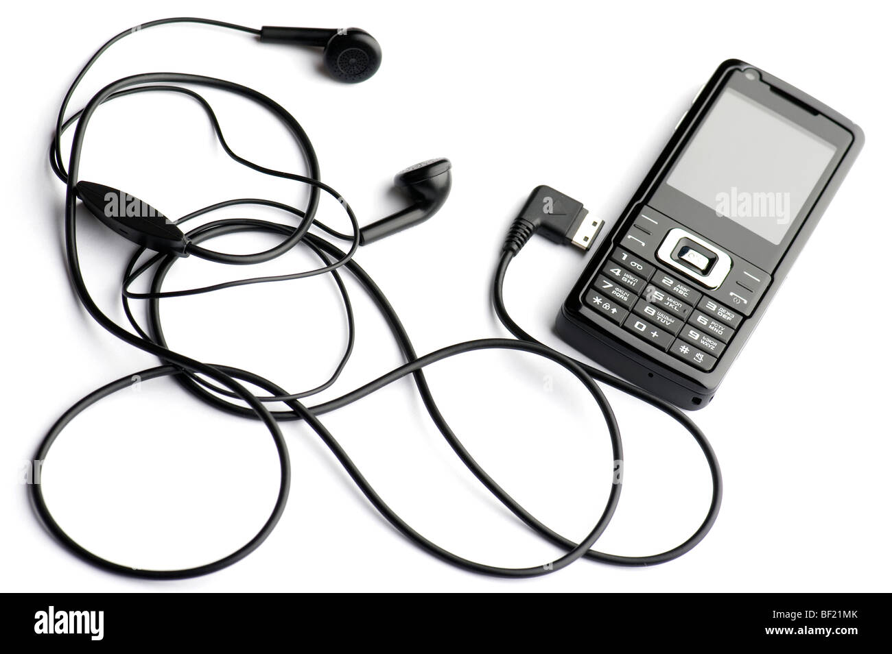 object on white - mobile phone with head set Stock Photo - Alamy