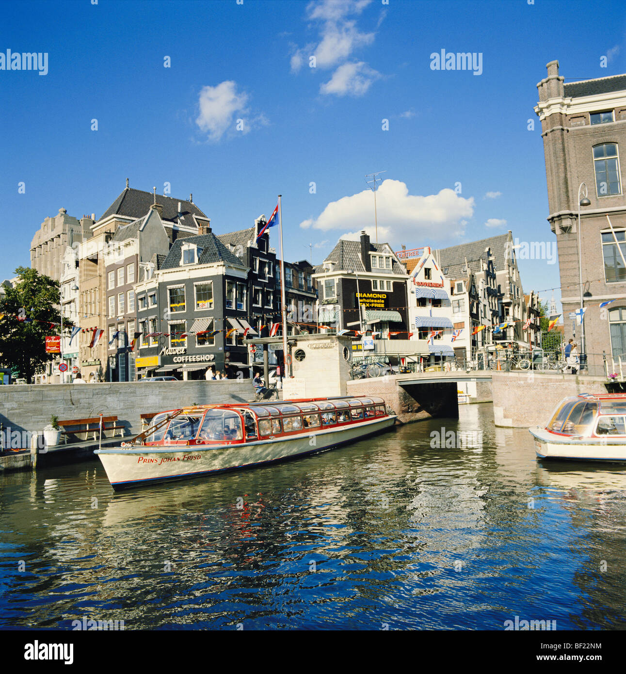 Tourist sightseeing canal boat Amsterdam, Holland, the Netherlands ...