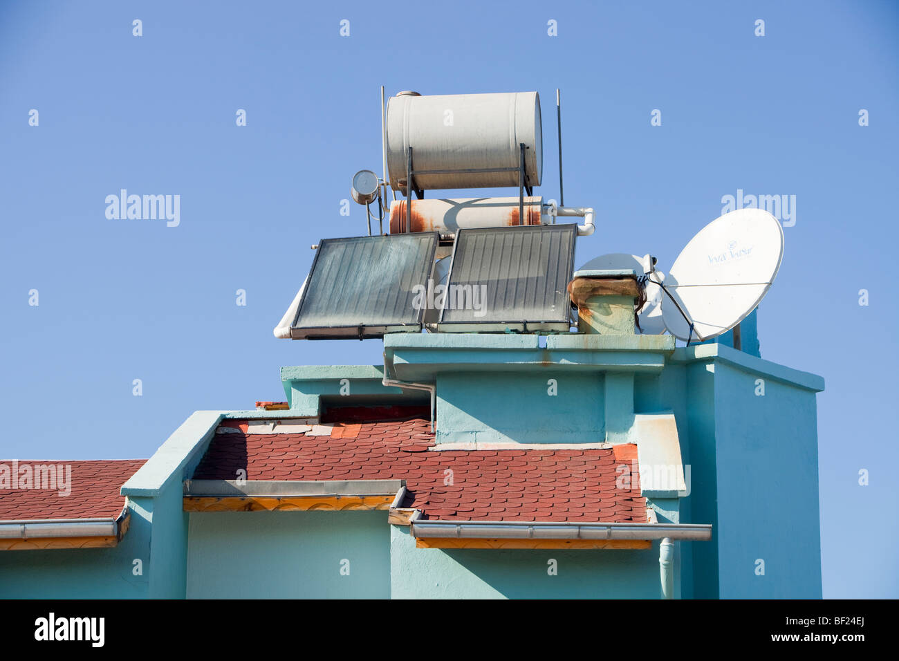Solar water heaters on house roofs in Teos, Turkey Stock Photo - Alamy