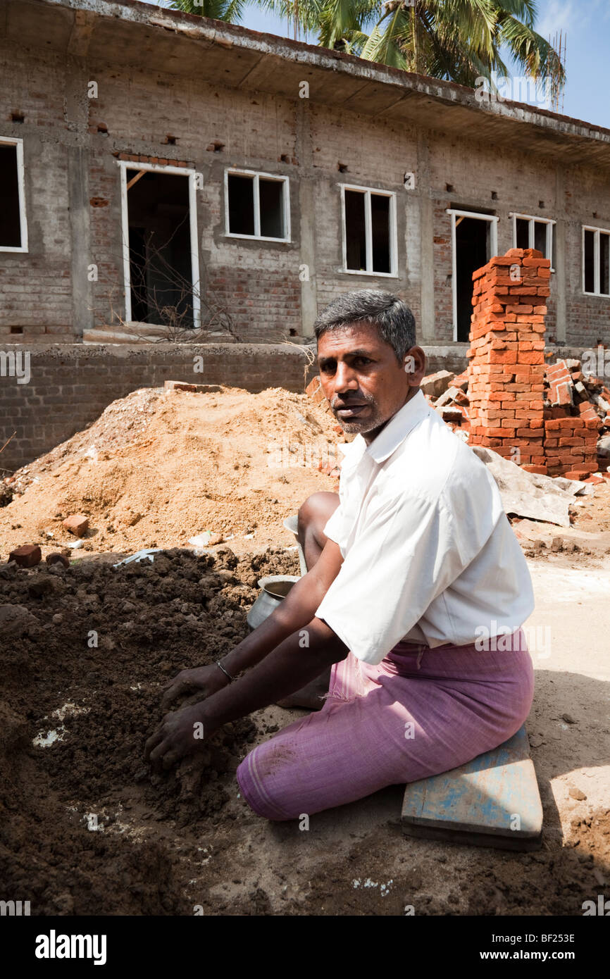 Male Indian laborer making bricks. Chennai Tamil Nadu India Stock Photo ...