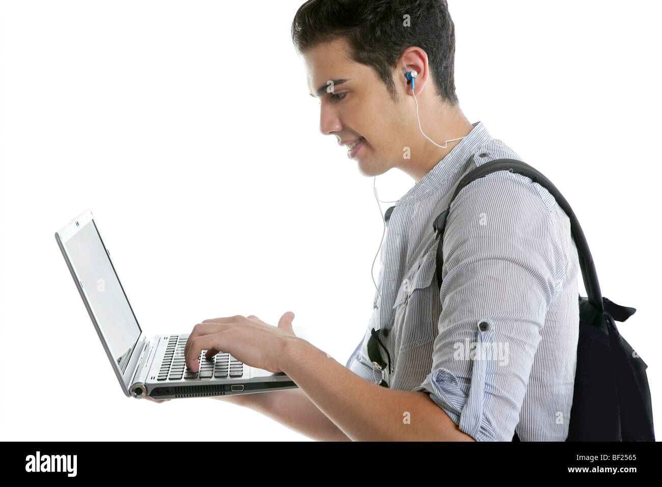 Male young student homework with laptop computer isolated on white ...