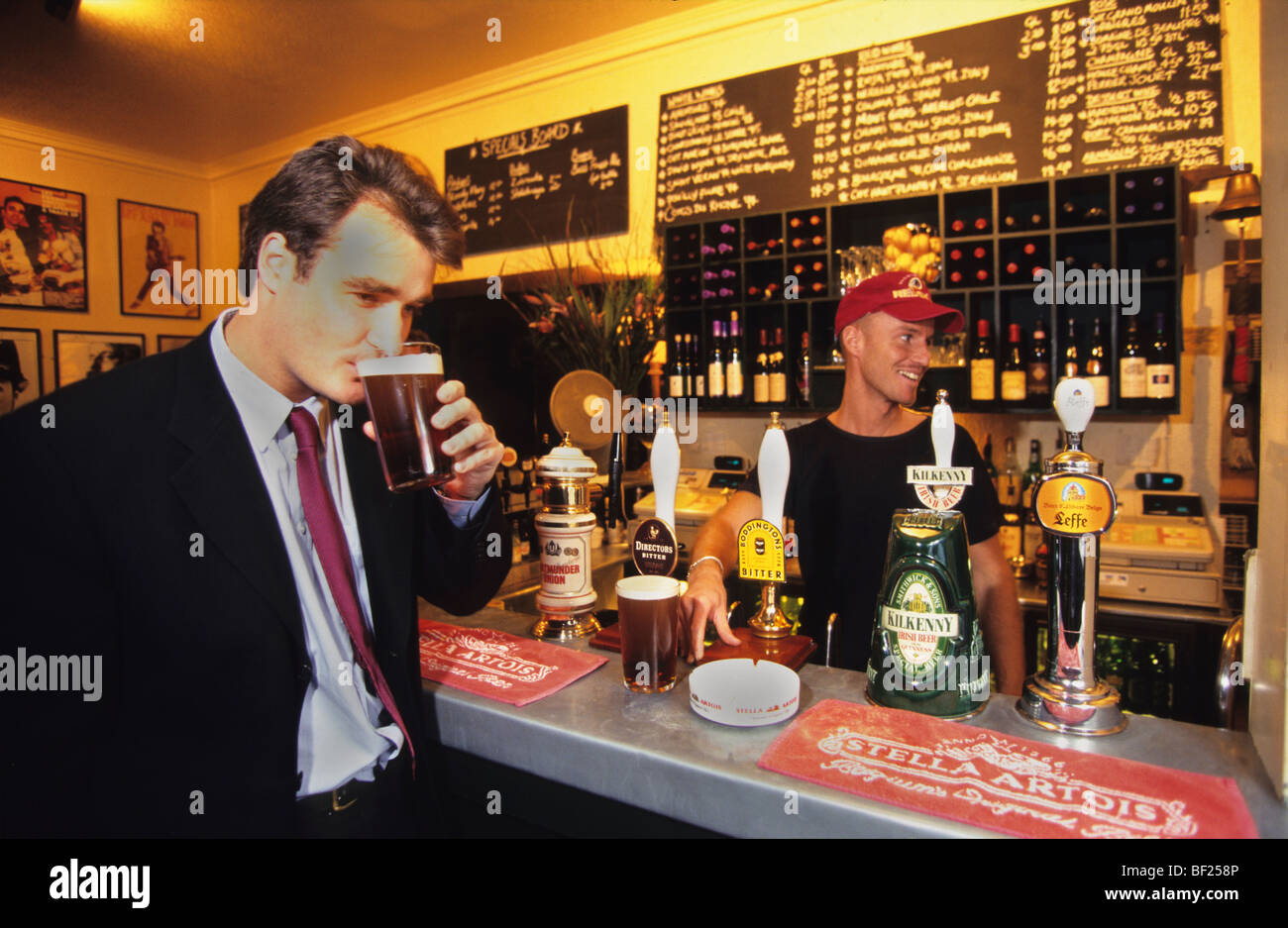 Man drinking a pint at Westbourne Pub, london Stock Photo - Alamy