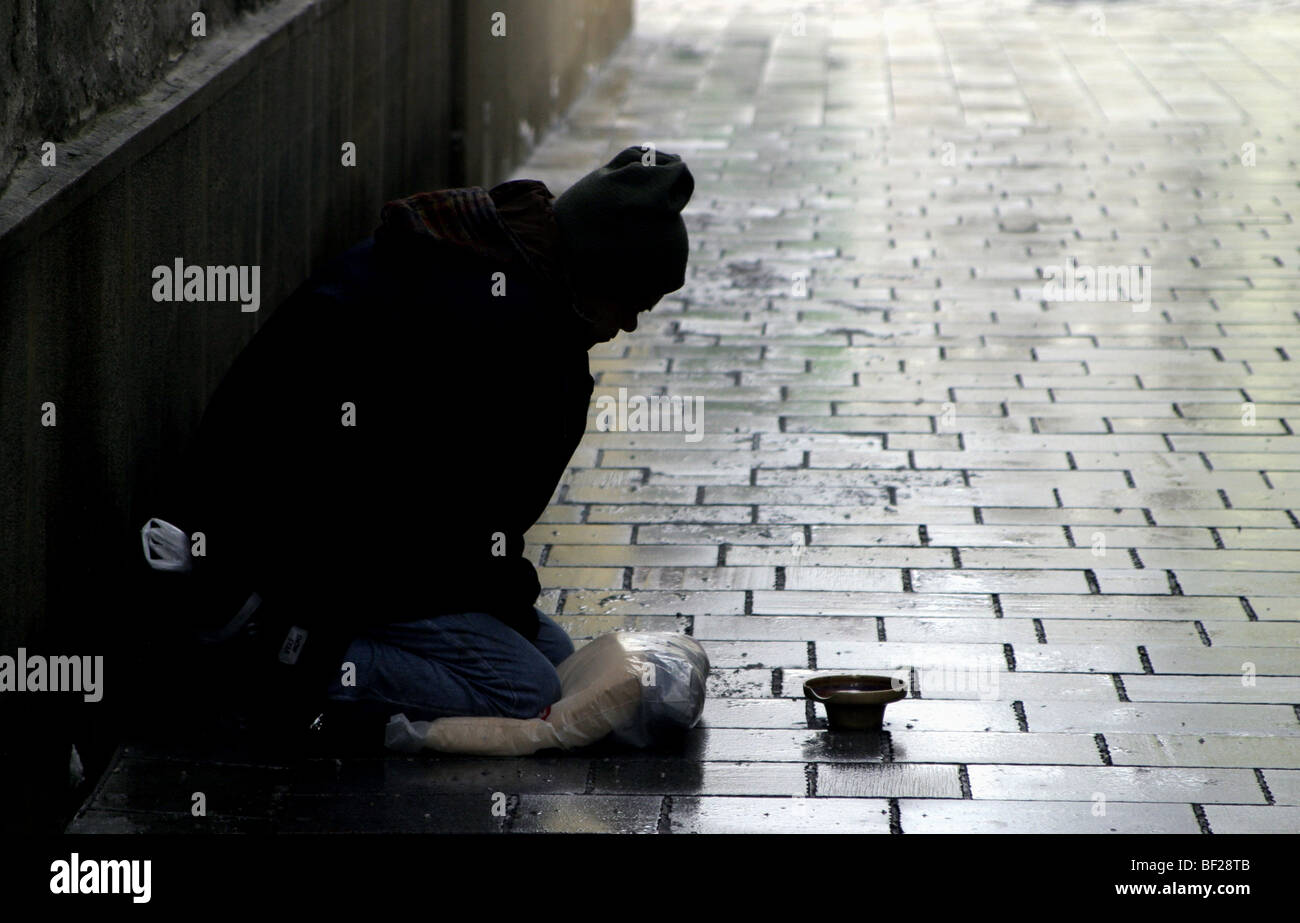 Alms beggar hi-res stock photography and images - Alamy