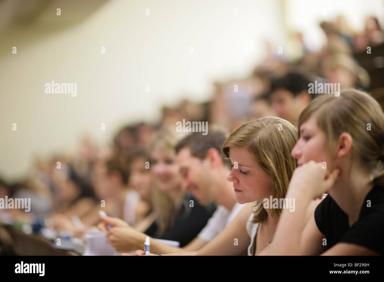 Students attending a lecture, Lecture theatre, Auditorium, University ...