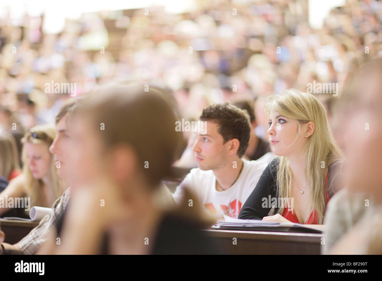 Students attending a lecture, Lecture theatre, Auditorium, University ...
