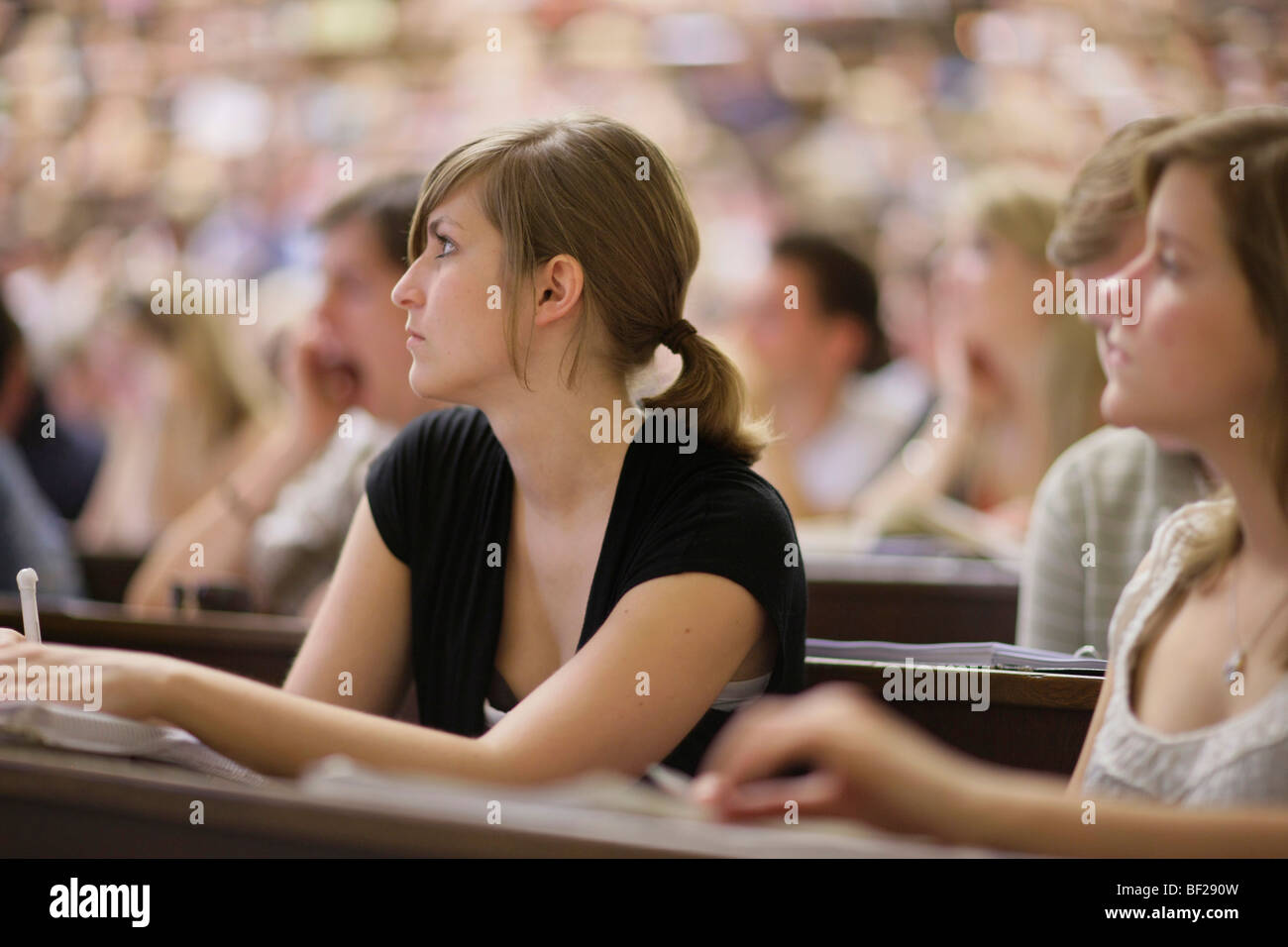 Students attending a lecture, Lecture theatre, Auditorium, University ...
