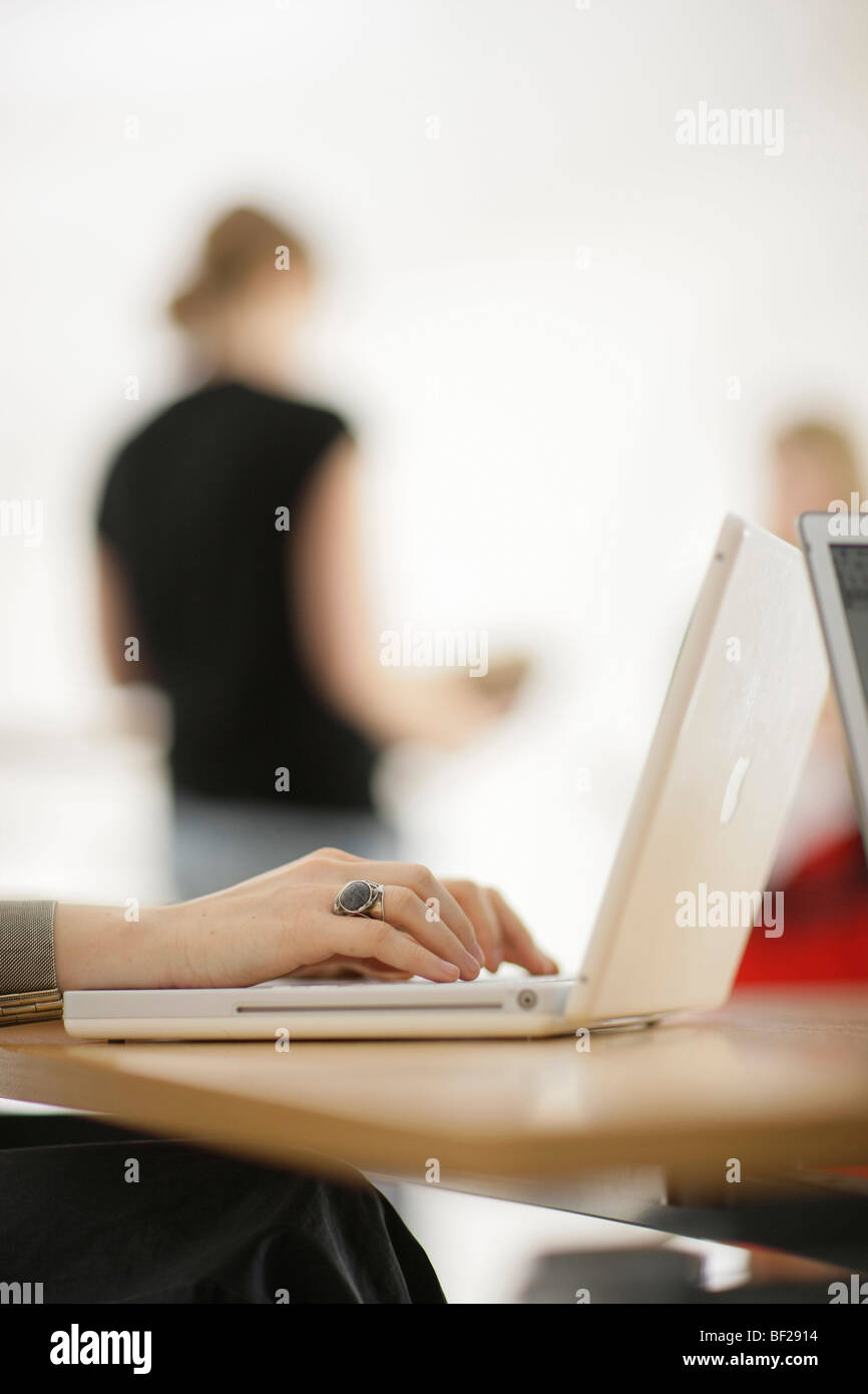 Student typing in a notebook, University, Education Stock Photo - Alamy