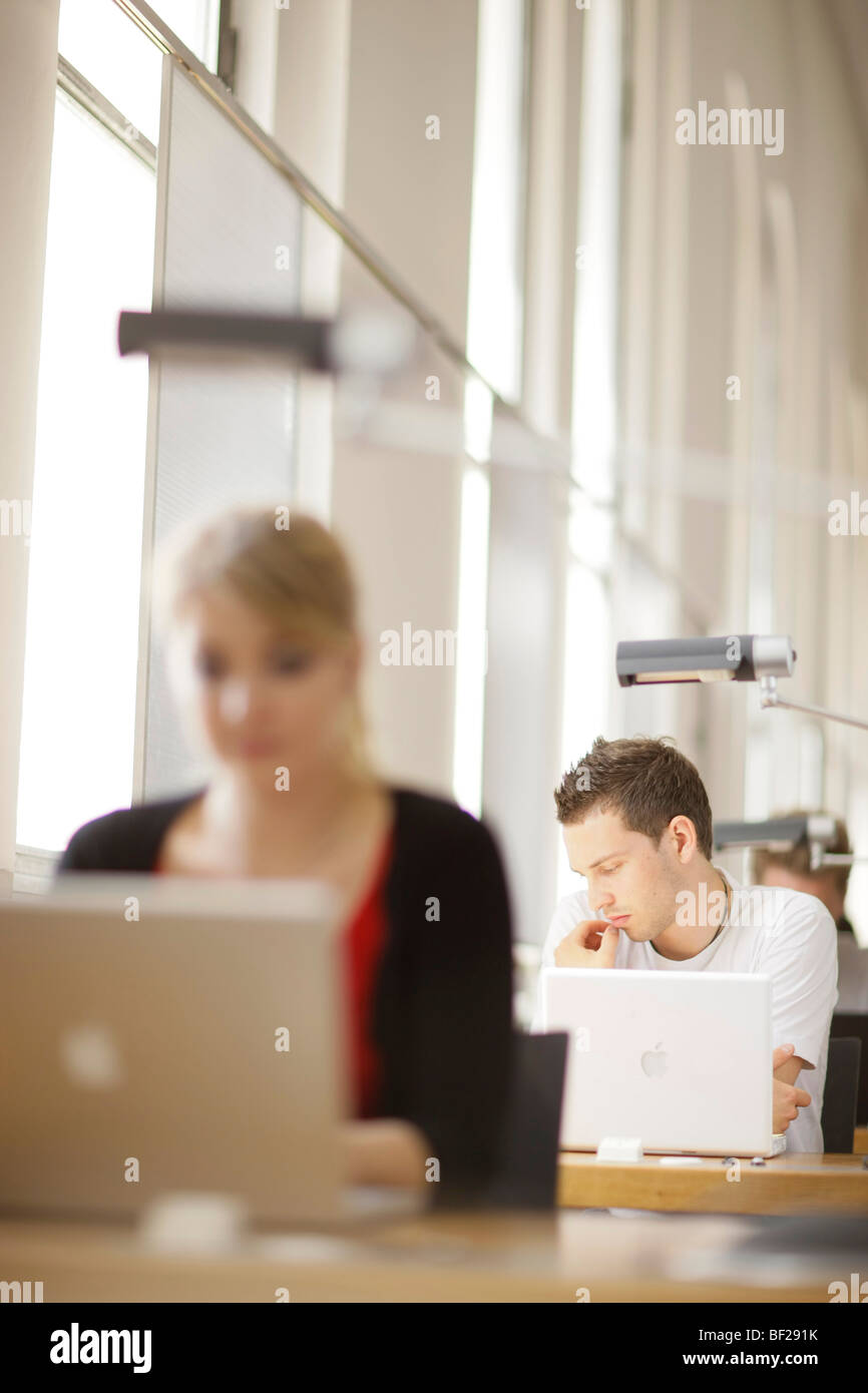 Two adults studying in library hi-res stock photography and images - Alamy