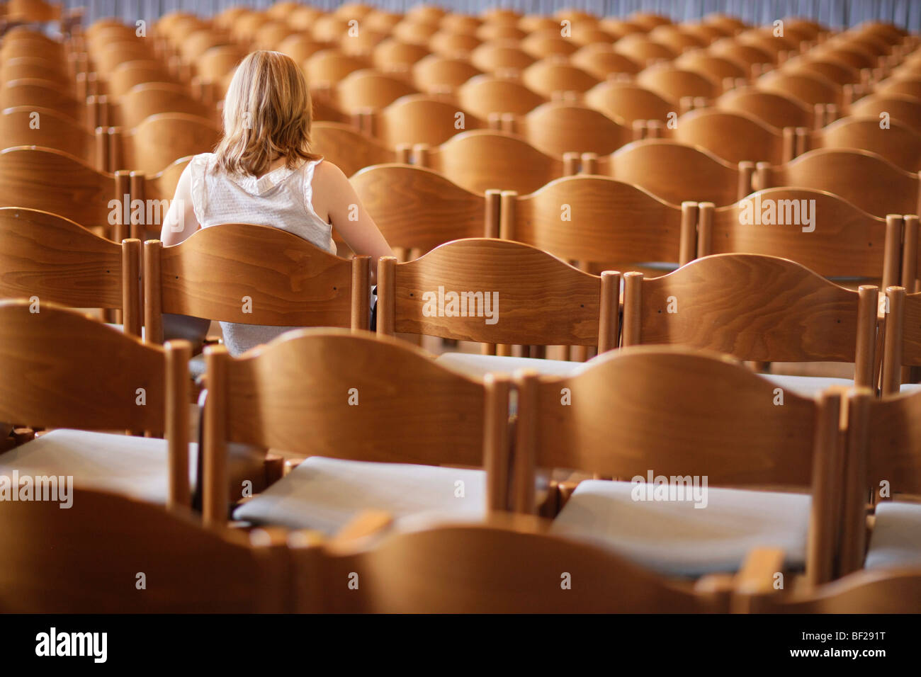 Student sitting in an empty lecture hall, University, Education Stock ...