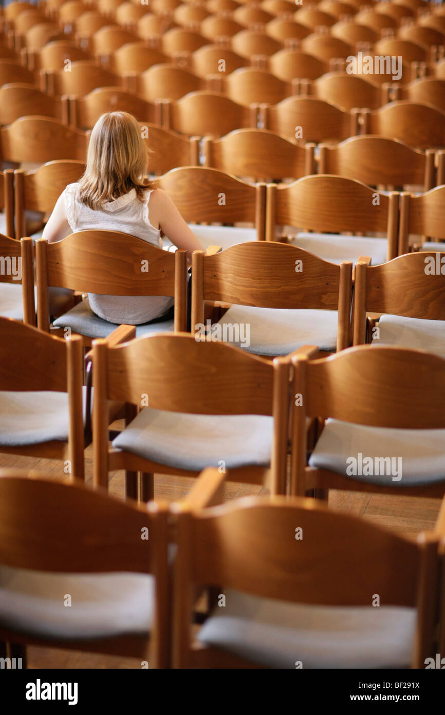 Student sitting in an empty lecture hall, University, Education Stock ...