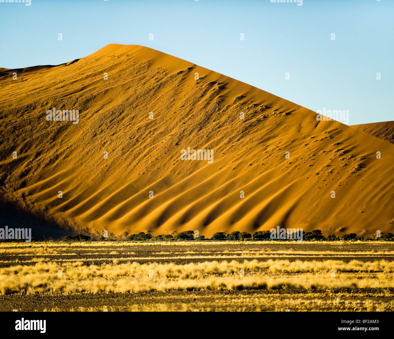 sunset NAMIBIA desert SOSSUSVLEI dunes yellow red orange sand dust wide ...