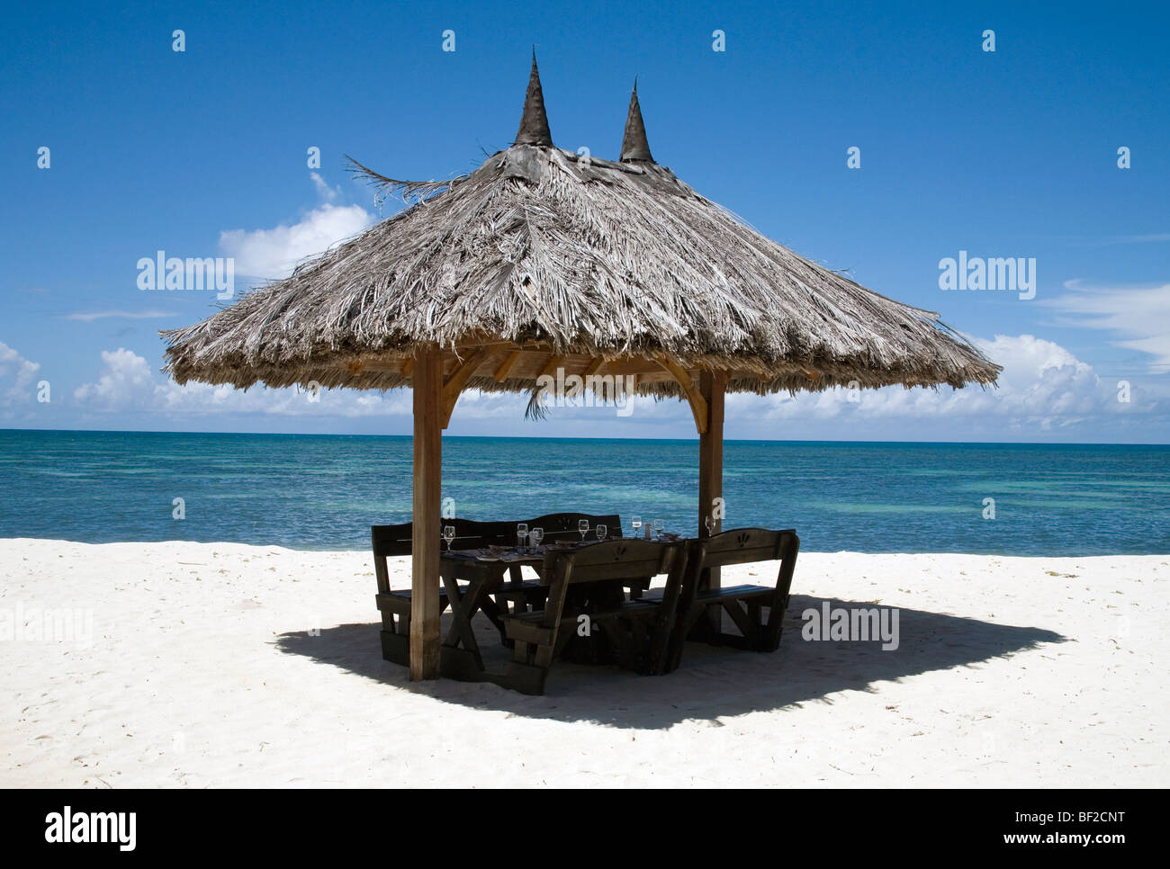 Covered dining area on tropical beach, Seychelles Stock Photo - Alamy