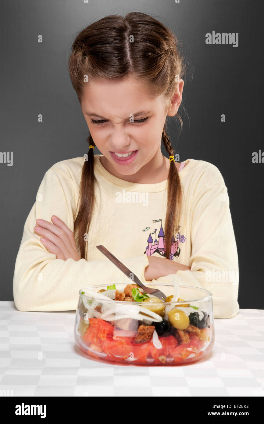 Girl refusing fruit salad Stock Photo - Alamy