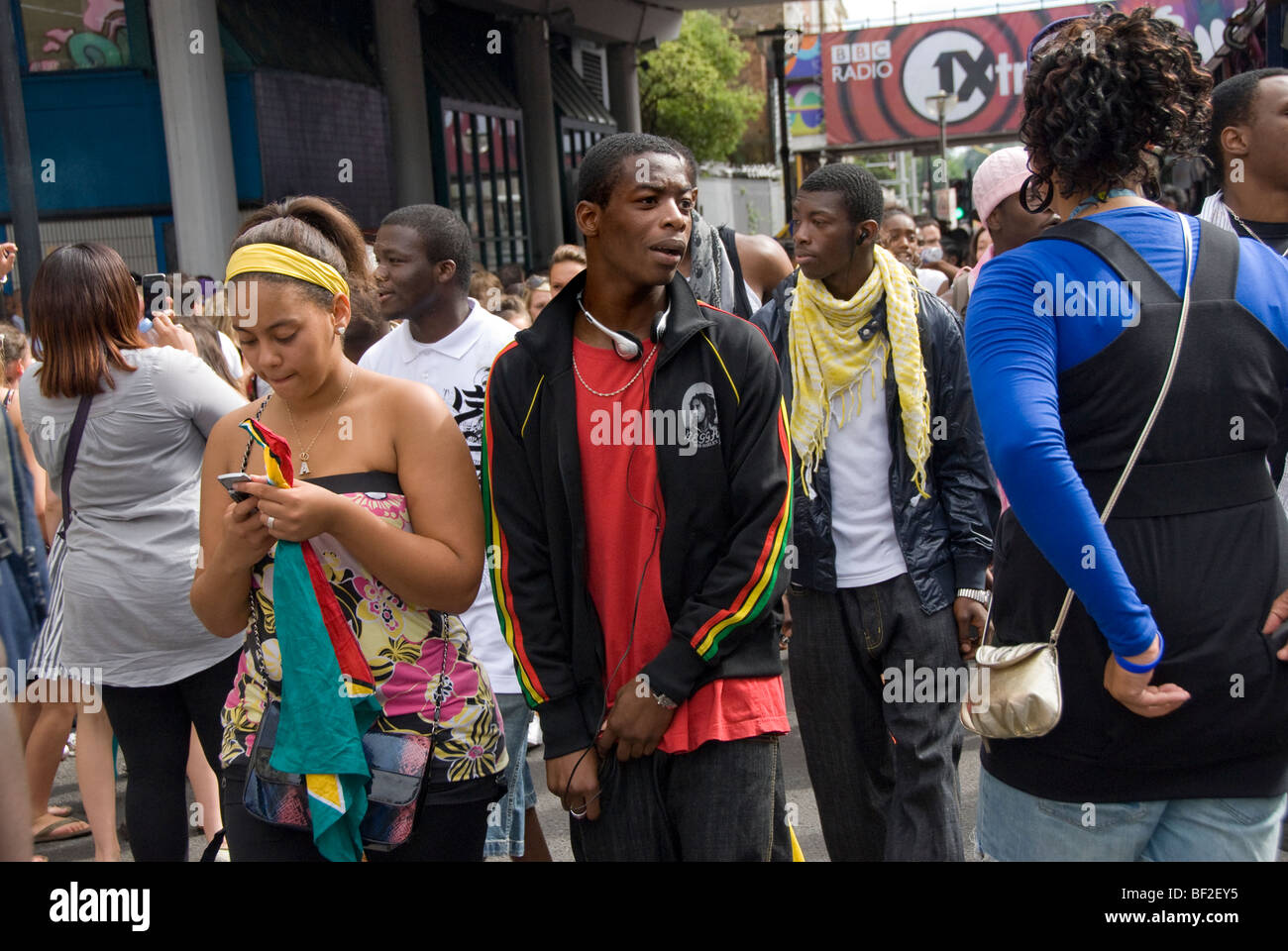Crowded multicultural street at Notting Hill Carnival time in West ...