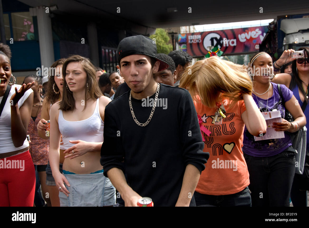 Crowded multicultural street at Notting Hill Carnival time in West ...