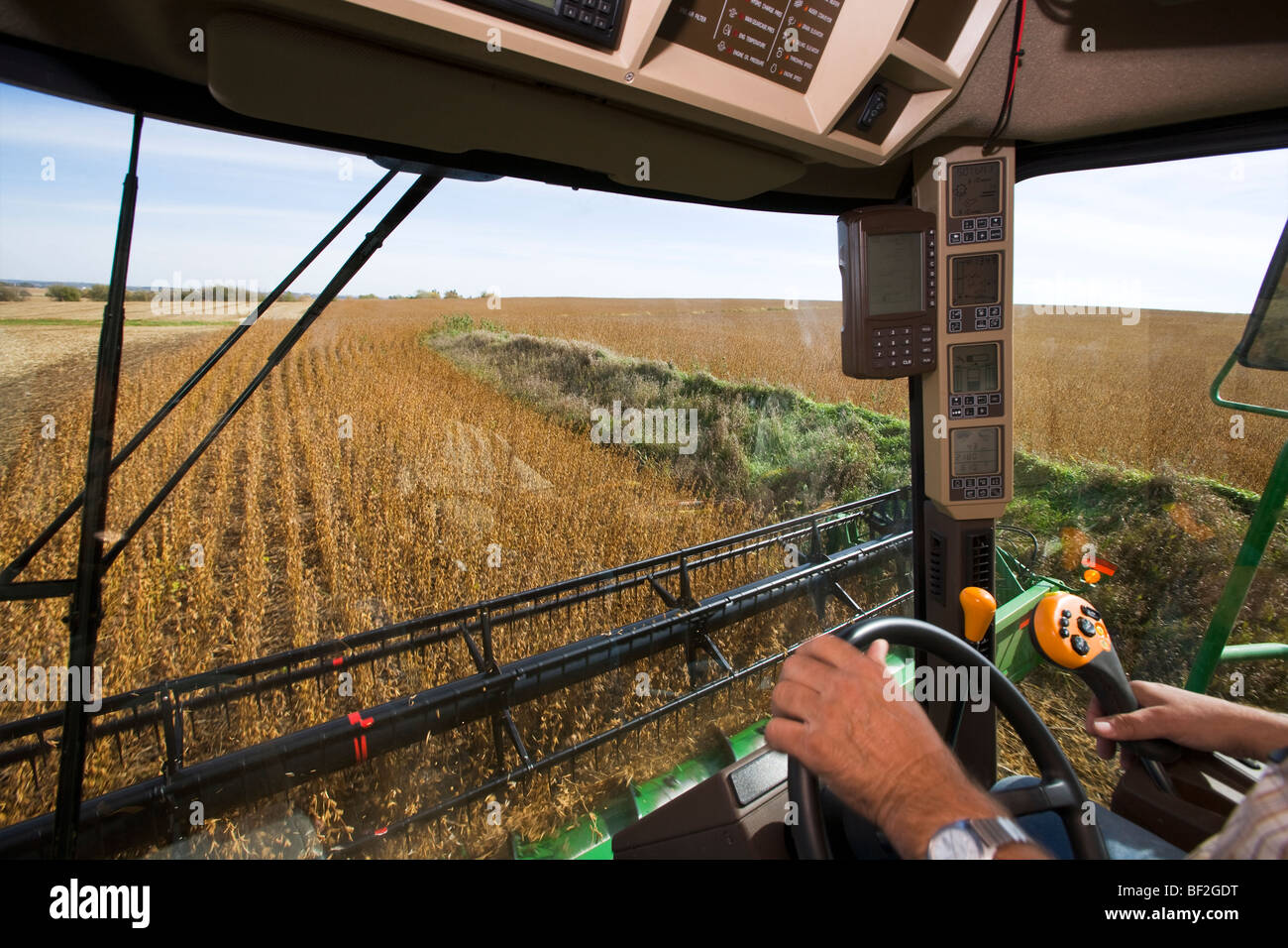 Interior of a combine during the soybean harvest showing the yield ...