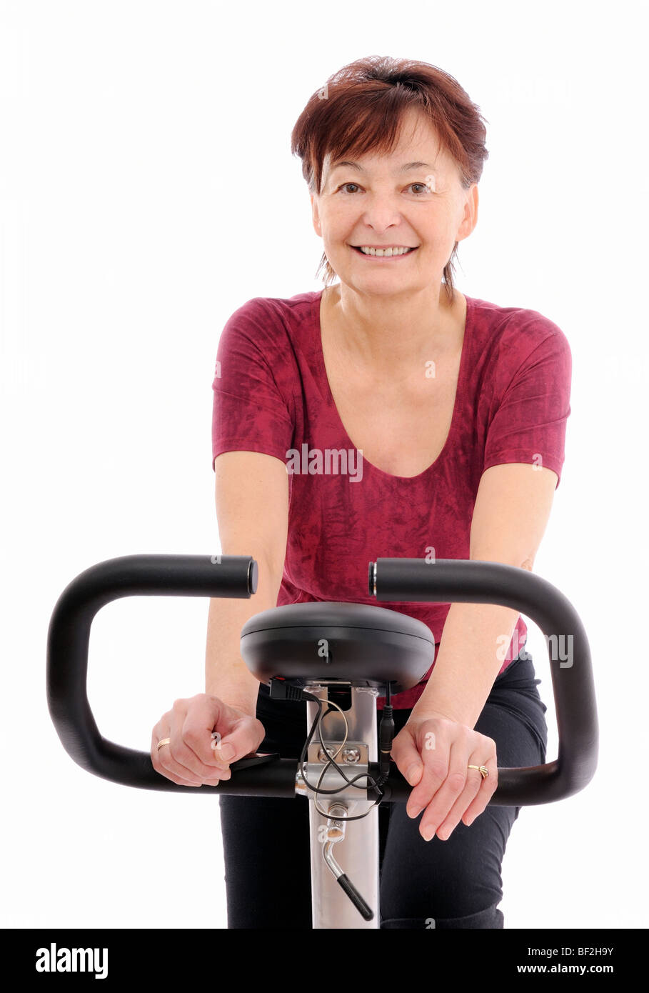Spinning - smiling senior woman - isolated Stock Photo - Alamy