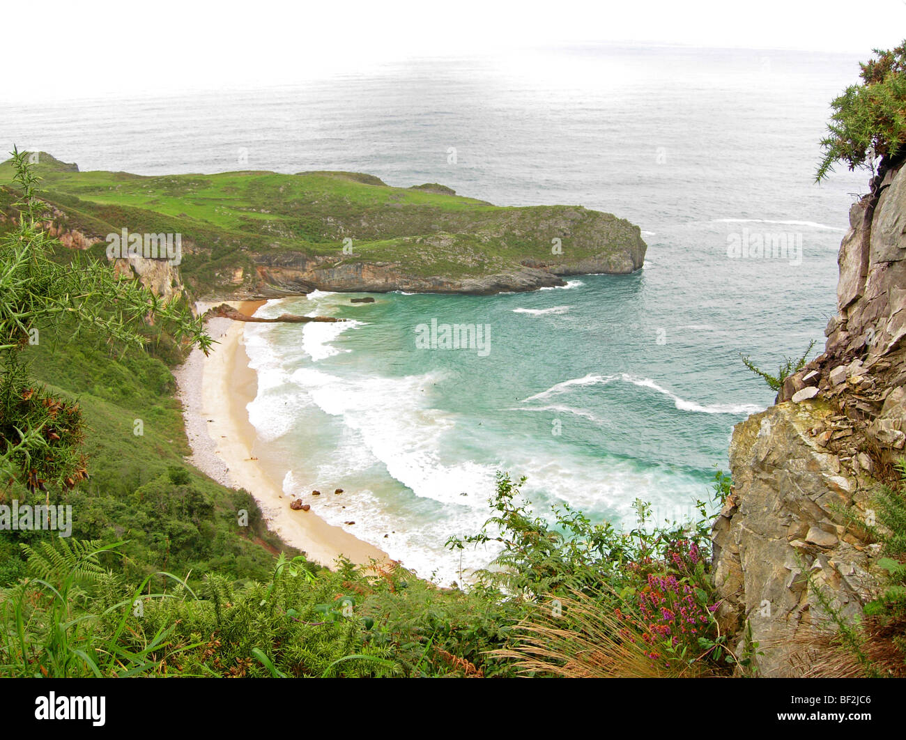 Quiet bay off the northern Spanish coast of Cantabria near Llanes Stock ...