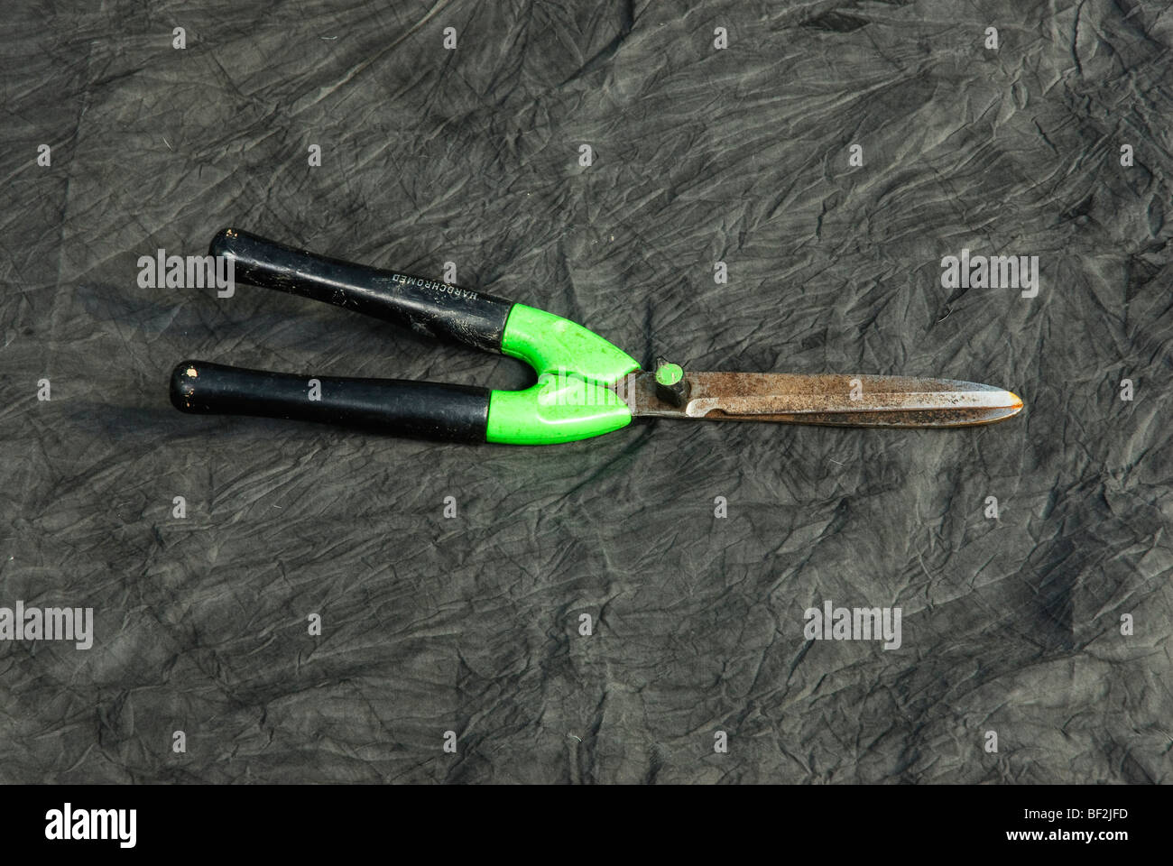 Rusty garden shears on canvas background Stock Photo - Alamy