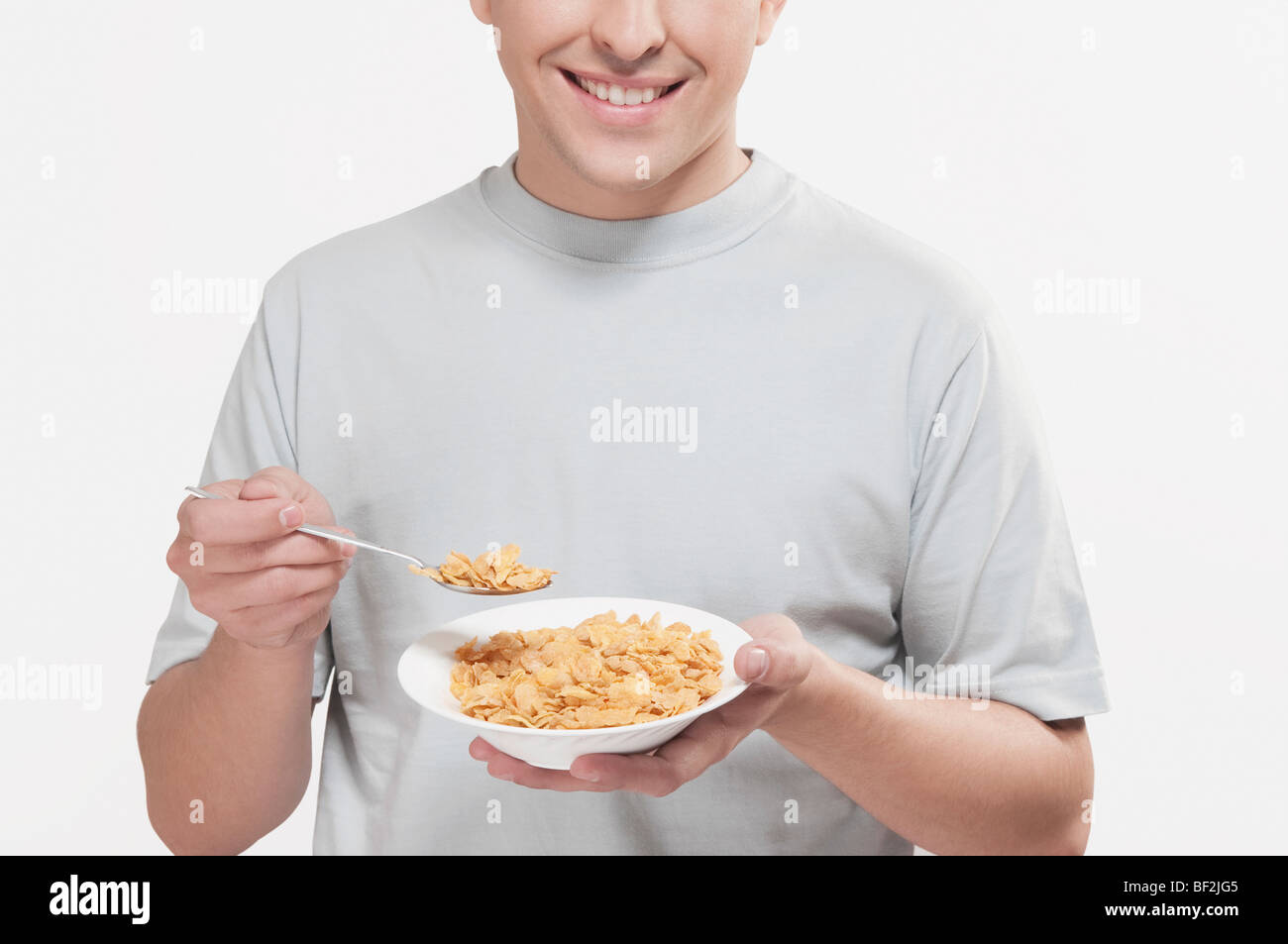 Man eating corn flakes hi-res stock photography and images - Alamy