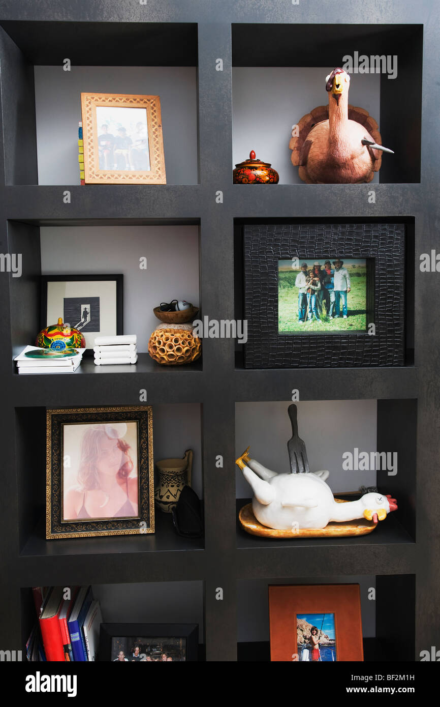 Close-up of a shelf with antiques Stock Photo - Alamy