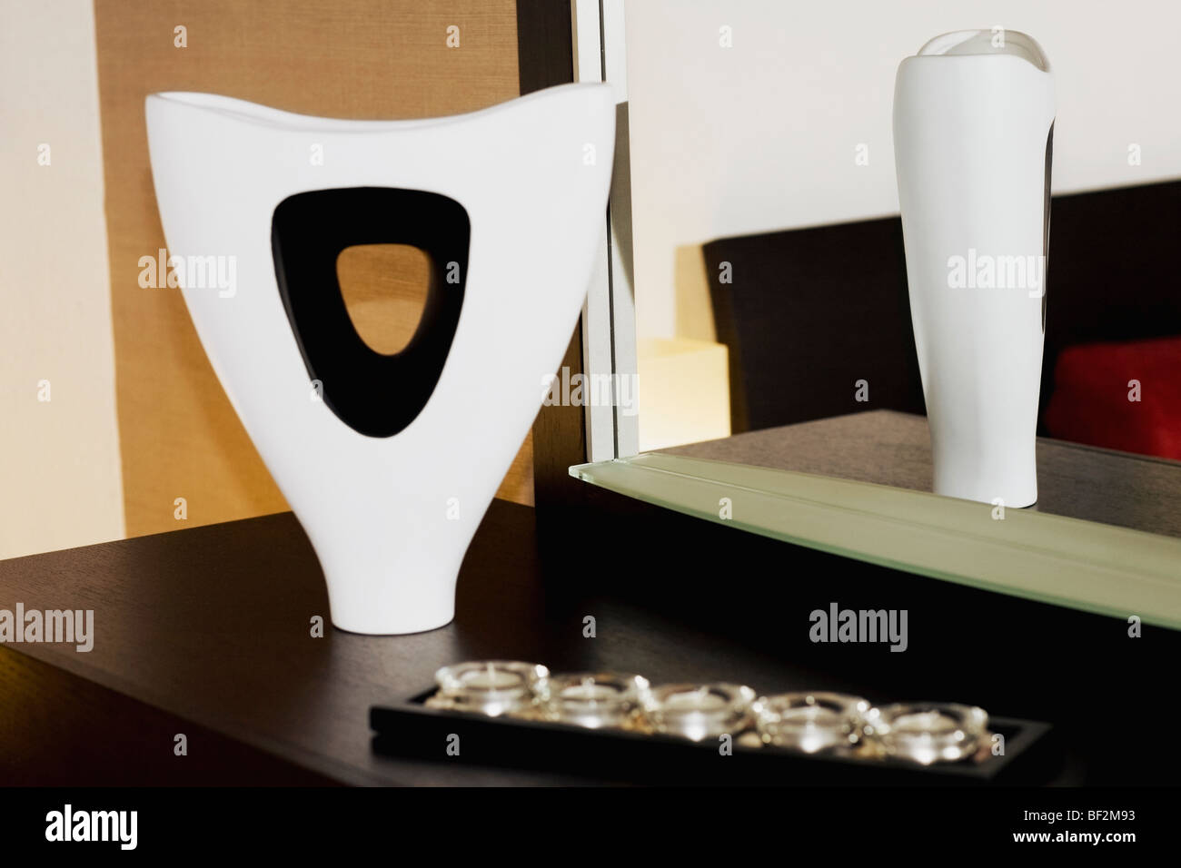 Reflection of a vase in a mirror Stock Photo - Alamy