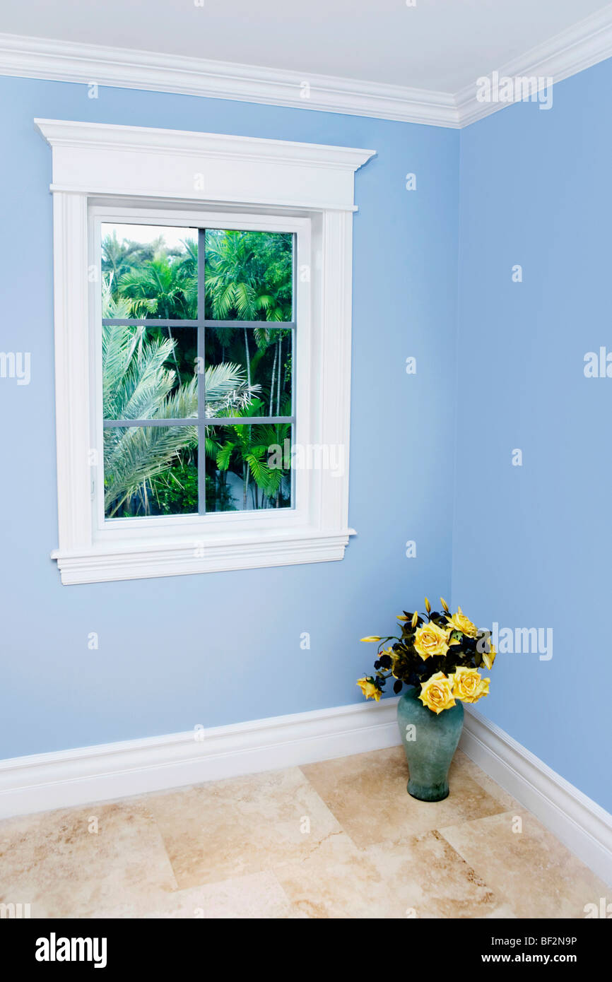 Flower pot in a room Stock Photo - Alamy