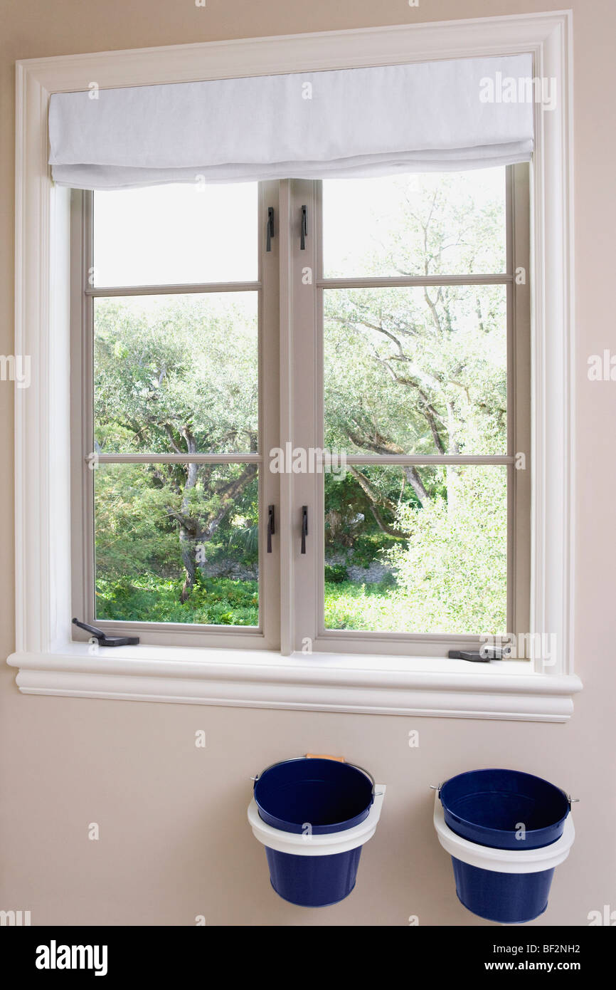 Garden viewed through a window Stock Photo - Alamy