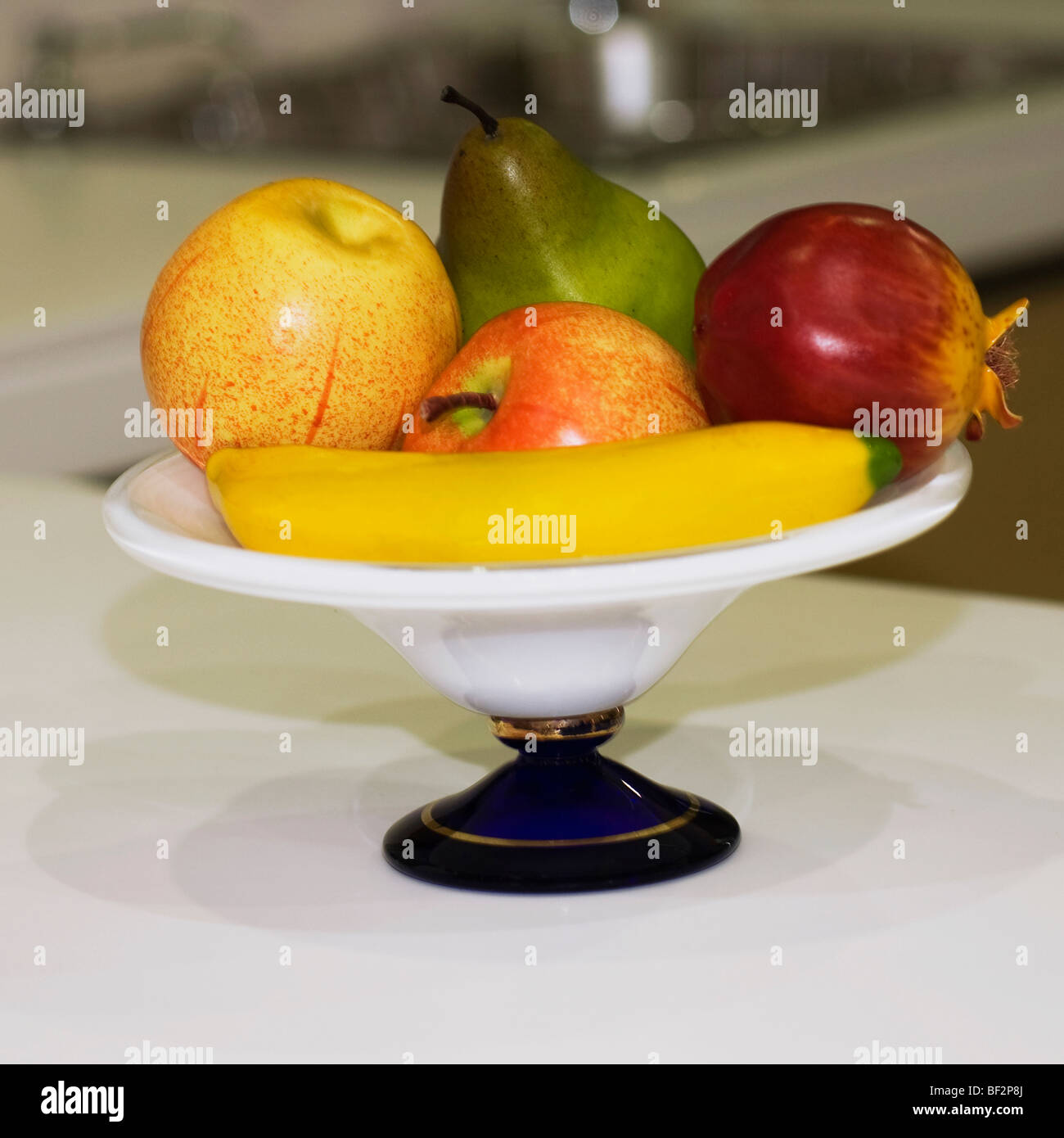 Fruits in a bowl Stock Photo - Alamy