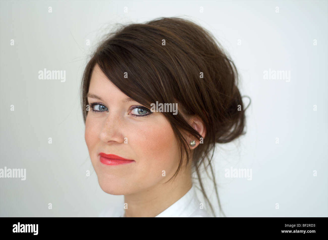 Woman is smiling into the camera Stock Photo - Alamy