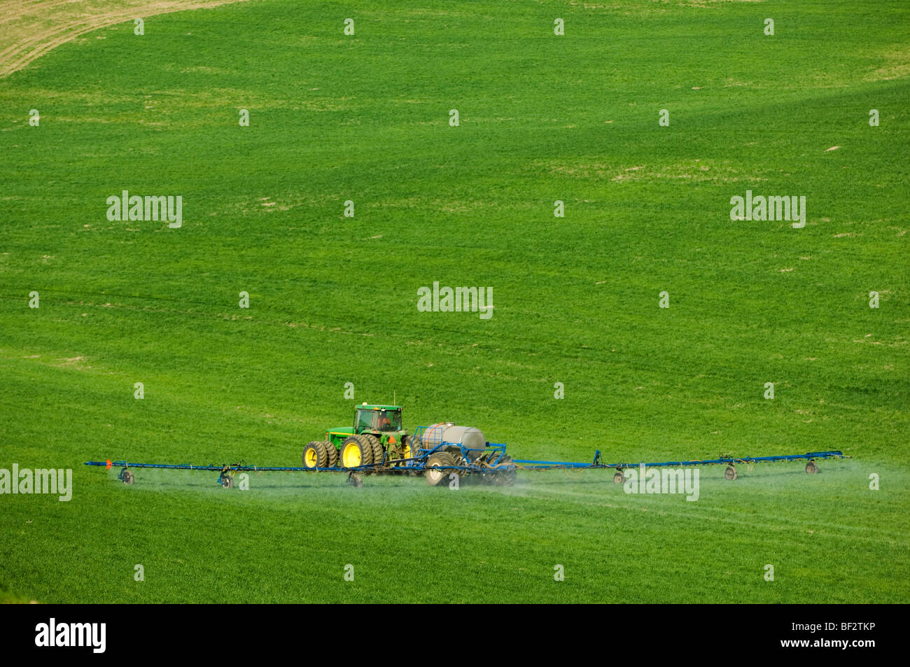 Spraying wheat crops field hi-res stock photography and images - Alamy
