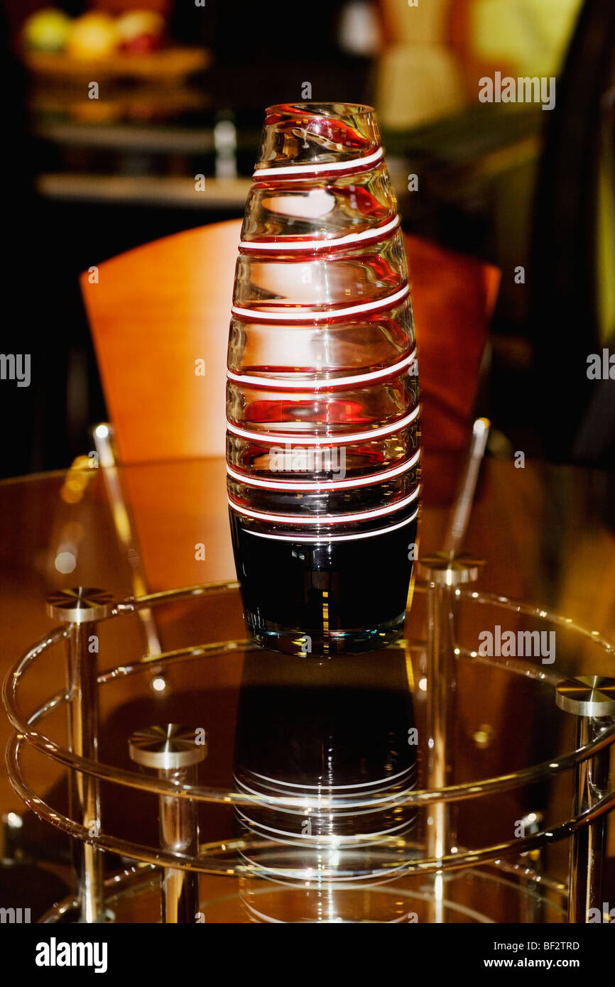 Vase on a dining table Stock Photo - Alamy